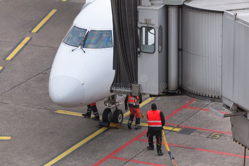 Airplane at an Airport Gate Stock Image - Image of transportation ...