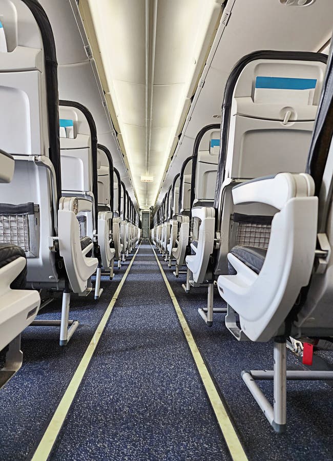 Airplane aisle center view stock photo. Image of travel - 290567426