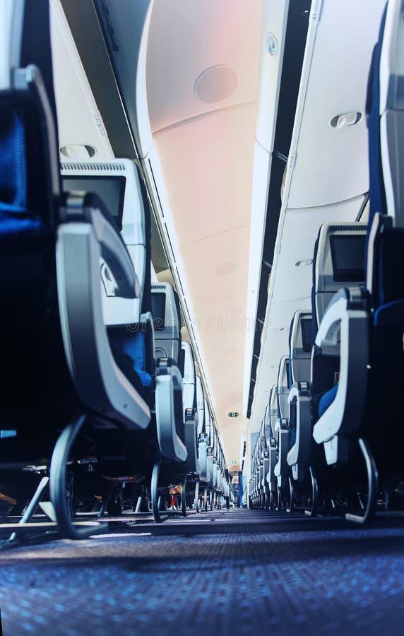 Airplane aisle stock image. Image of airline, comfortable - 28433743