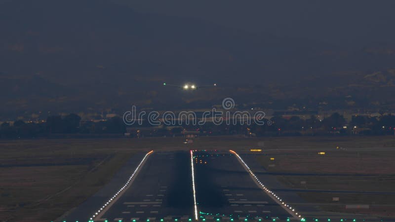 Nighttime runway approach stock video. Video of travel - 314368993