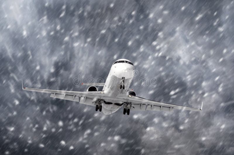 Airplane Approaching on a Landing in Snowstorm Bad Weather. Stock Image ...