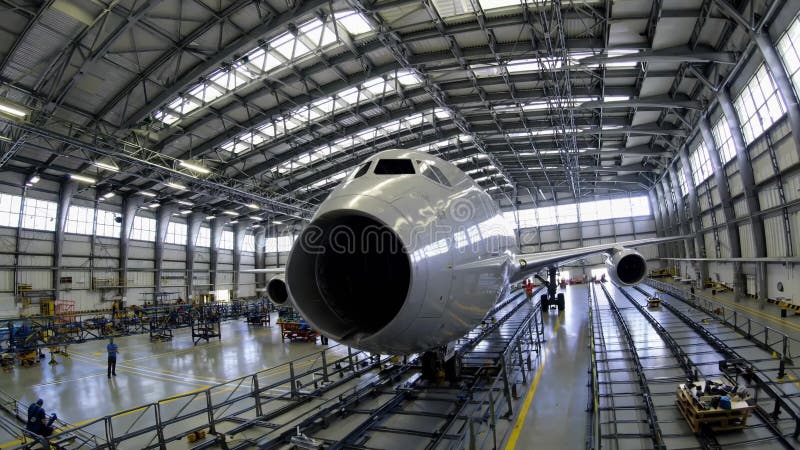 Airplane Assembly Process in a Large Hangar Stock Footage - Video of ...