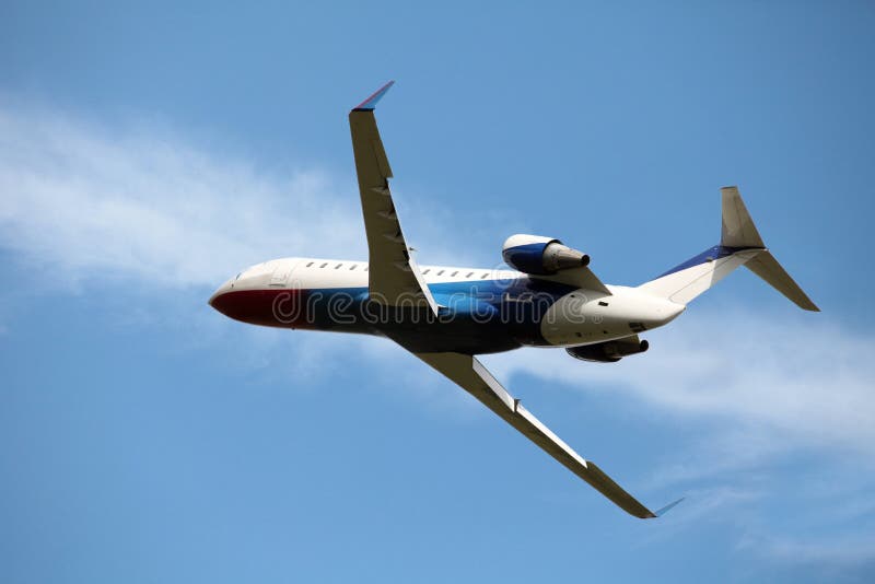 Airplane in the blue sky stock image. Image of commercial - 26321265