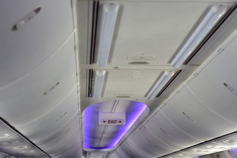 Airplane cabin ceiling stock photo. Image of exit, flight - 113524100