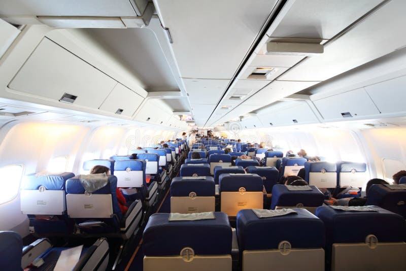 Airplane Cabin with Passengers Stock Image - Image of tourism, indoor ...
