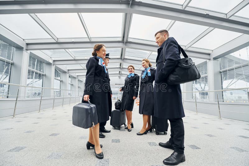 Airplane Crew in Uniform is Going To the Work Together Stock Photo ...