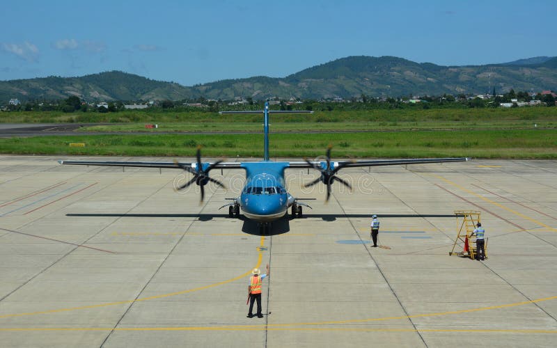 An Airplane Docking at the Airport in Dalat, Vietnam Editorial Stock ...