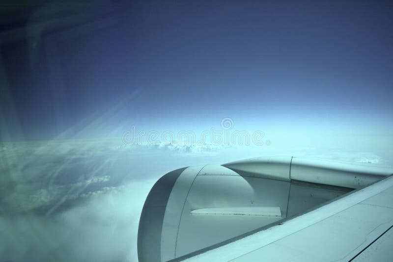 Airplane Wing in mid sky stock photo. Image of people - 125683510