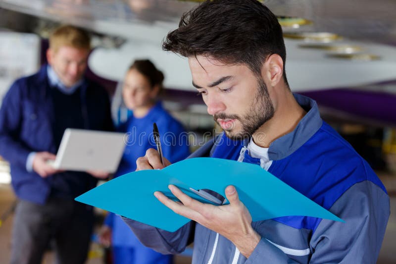 Airplane Engineer Taking Notes on Notepad Stock Image - Image of ...