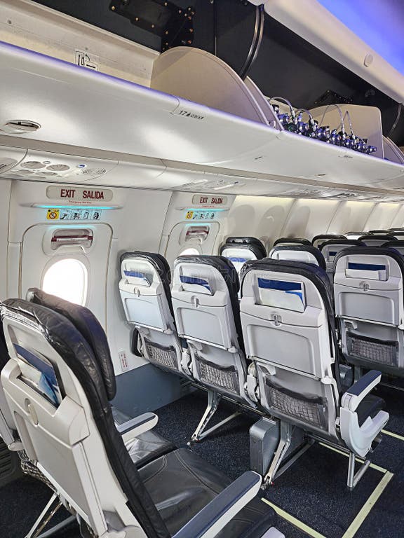 Airplane Exit Row Leg Space Stock Photo - Image of transport, airplane ...