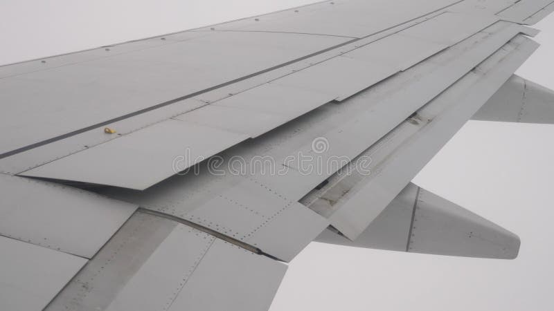 Airplane flaps moving stock image. Image of aerial, board - 269675721