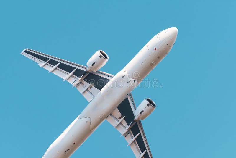 Airplane Flies Above Sky Close Up View Stock Photo - Image of sunlight ...
