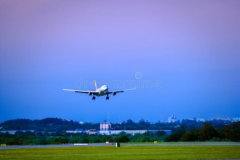 Airplane Flight Arrive in Airport Stock Image - Image of sunset ...