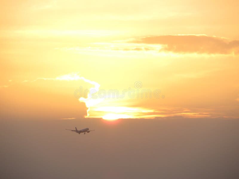 Airplane Flight in the Sky at Sunset Stock Photo - Image of secret ...