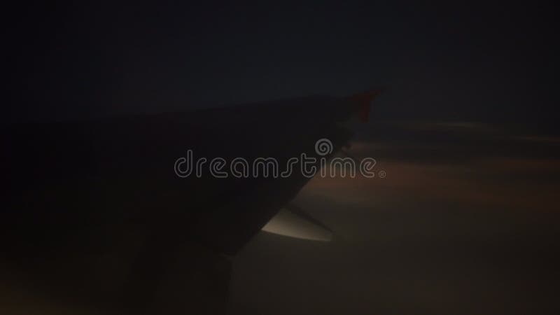 Airplane Flight. View from Illuminator, Wing of an Airplane in Front of ...