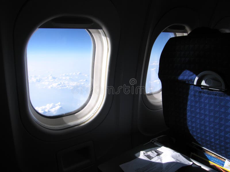 Airplane Flight - View from the Seat Stock Photo - Image of pane, shade ...