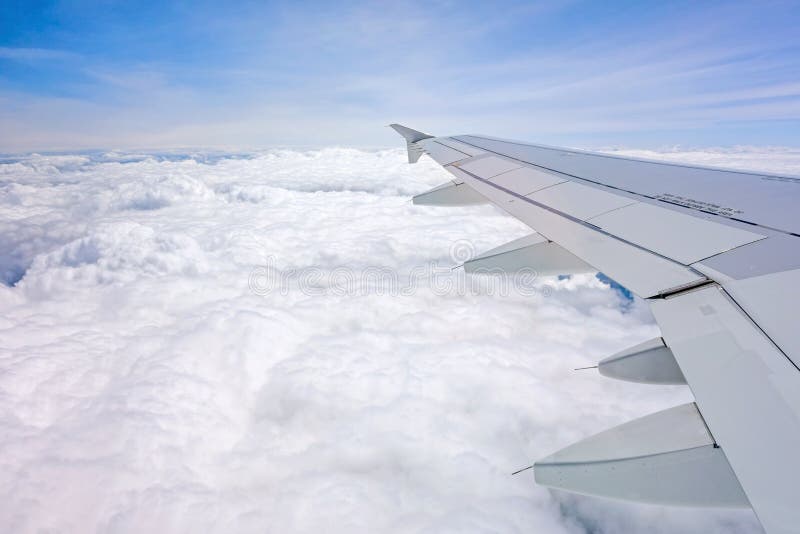 Airplane Flight - Window View Over the Clouds Stock Photo - Image of ...