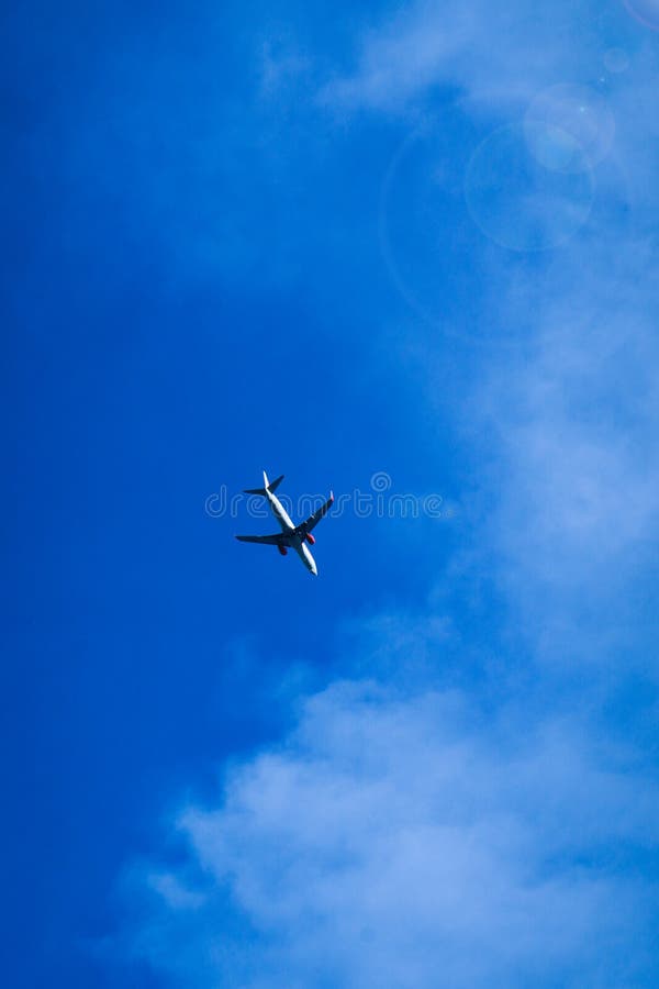 Airplane Flying in Blue Sky Stock Image - Image of landscape, airspeed ...
