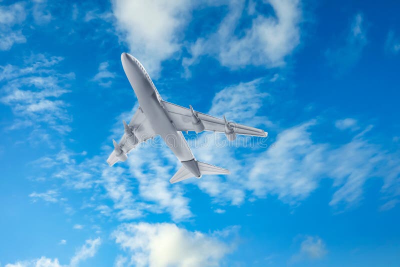 Airplane Flying in Blue Sky with Clouds. Air Transportation Stock Photo ...