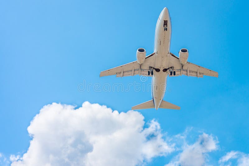 An Airplane Flying in the Blue Sky Stock Image - Image of plane ...