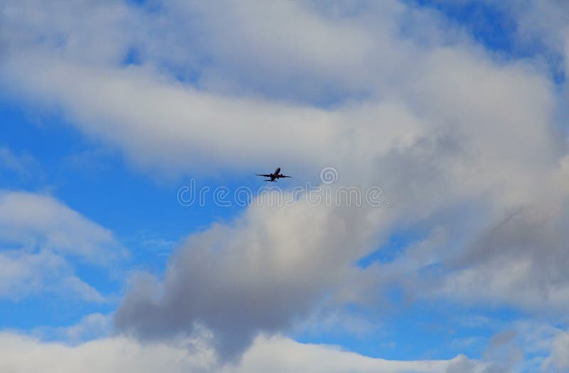 Airplane Flying through Dark Stormy Clouds Stock Photo - Image of ...