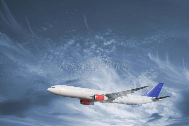 Airplane Flying in Dramatic Sky Stock Photo - Image of business ...