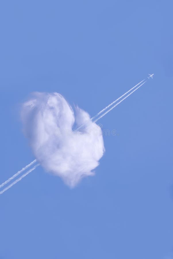 Airplane Flying through Heart Shaped Cloud Stock Image - Image of cupid ...