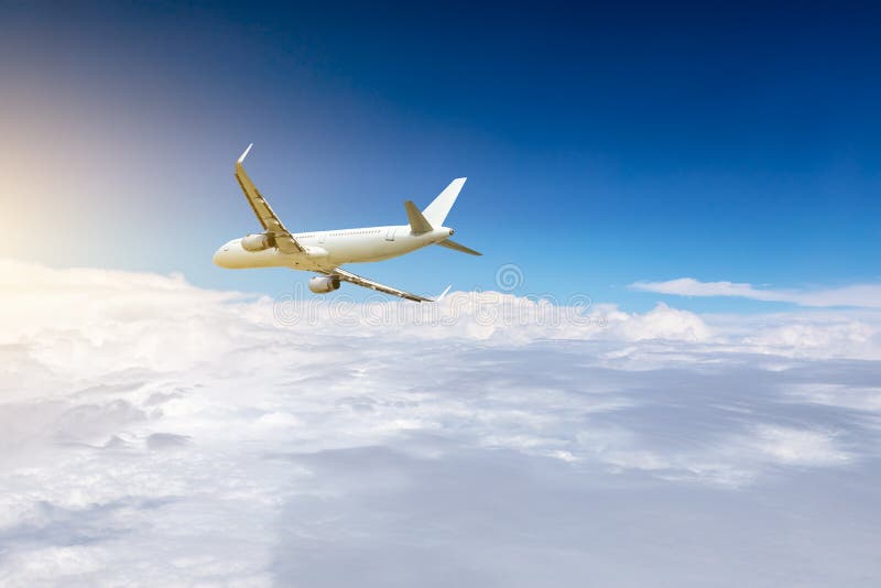 Airplane Flying at High Altitude and Beautiful High-altitude Clouds ...