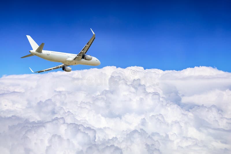 Airplane Flying at High Altitude and Beautiful High-altitude Clouds ...