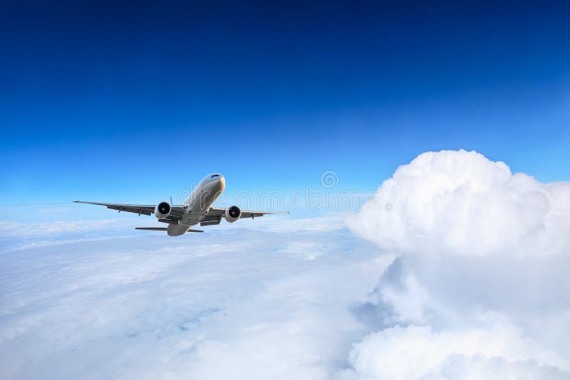 Airplane Flying at High Altitude and Beautiful High-altitude Clouds ...