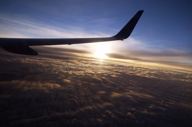 Airplane Flying High in the Blue Sky Stock Image - Image of machine ...