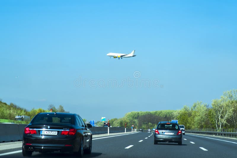 2019 Austria.Airplane Flying Over Highway Road.the Plane Flies Over the ...