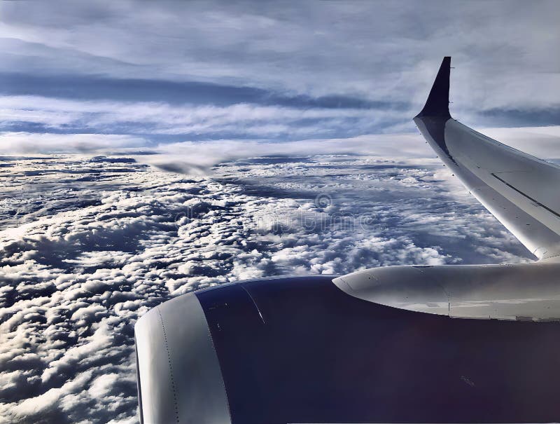 Airplane Flying Over Clouds with Wing and Engine Stock Photo - Image of ...