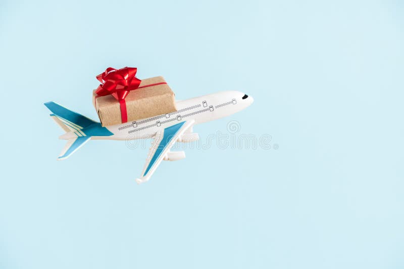 Airplane Flying in the Sky with Gift with Copy Space Stock Photo ...