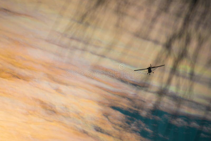Airplane Flying in a Sunset Full of Colors Stock Photo - Image of ...