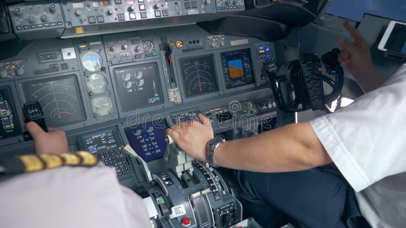 Airplane Interior. Hand of Pilot Push Thrust Lever Handle for Engine ...