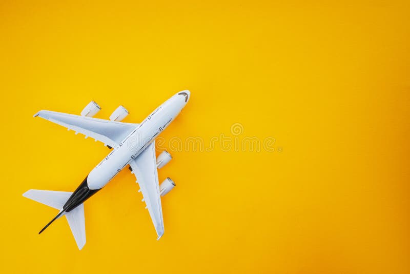 Airplane Isolated on Yellow Background Stock Image - Image of isolated ...