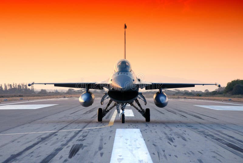 Airplane Landing on the Asphalt Runway on the Sunset Stock Photo ...
