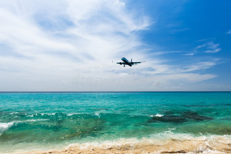 Airplane Landing Over the Sea Stock Image - Image of season, exotic ...