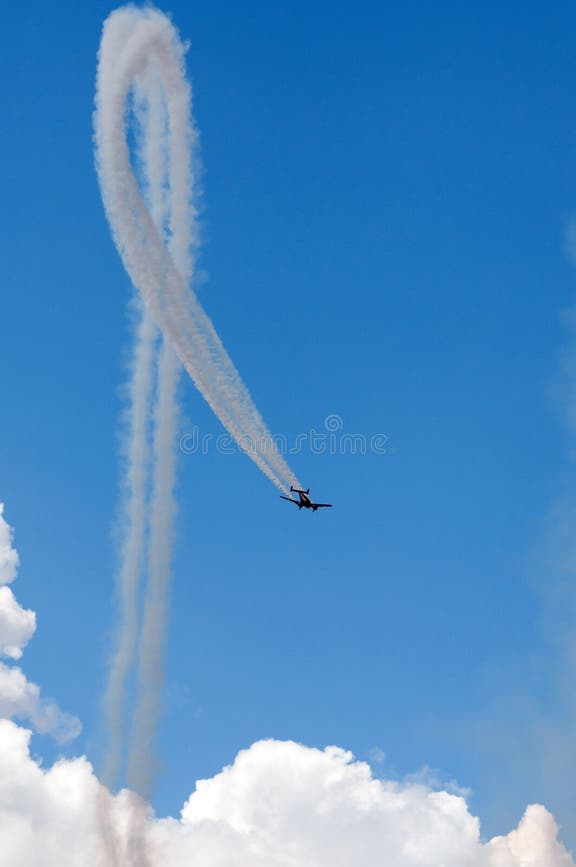 Airplane loop stock image. Image of plane, trail, twin - 59776761