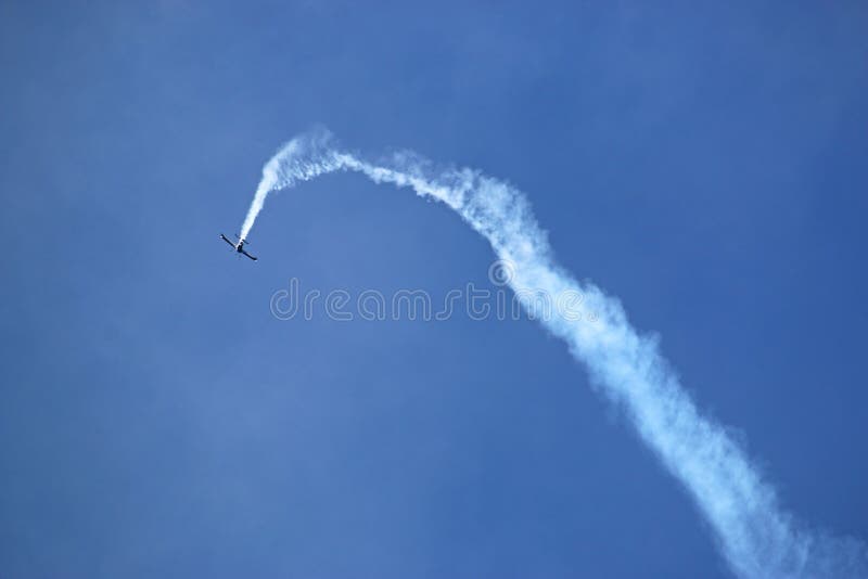 Airplane Looping the Loop with a Vapour Trail Stock Image - Image of ...