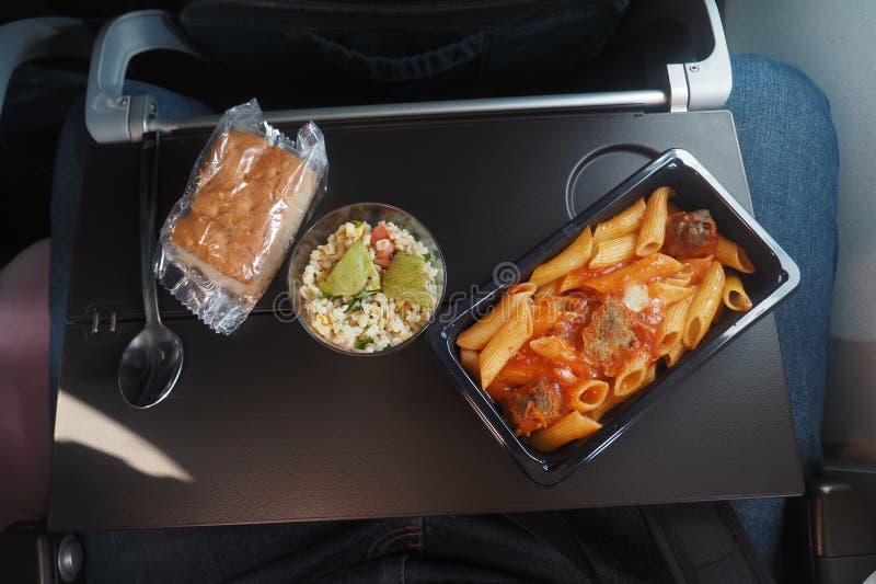 Airplane Meal Featuring Pasta with Bread Roll and Creamy Vegetable ...
