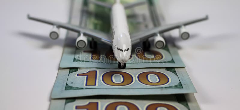 Airplane Model on Runway of 100 Dollar Paper Money Bills Stock Photo ...