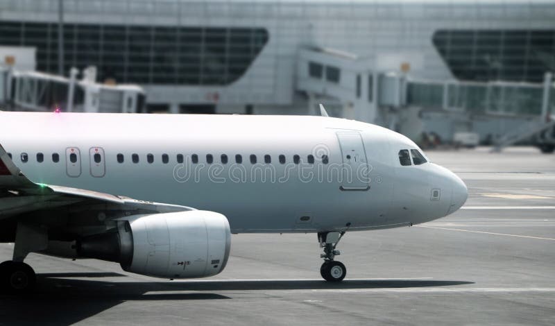 Airplane Moving on the Ground from Side View Stock Photo - Image of ...