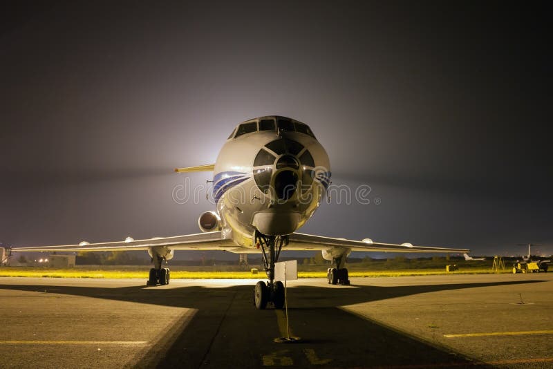 Airplane at night stock photo. Image of dusk, civil, aircraft - 66503760