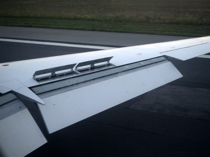 Airplane Open Flaps while Landing Stock Photo - Image of airliner ...