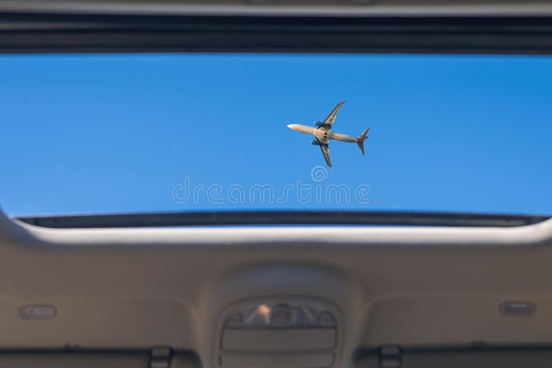 Airplane from Open Hatch of the Car during Summer Vacation. Stock Image ... Airplane from Open Hatch of the Car during Summer Vacation. Stock Image ...