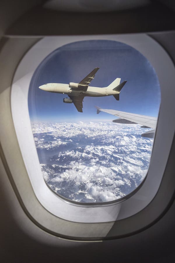 Airplane Outside an Airplane Window during Flight Stock Photo - Image ...