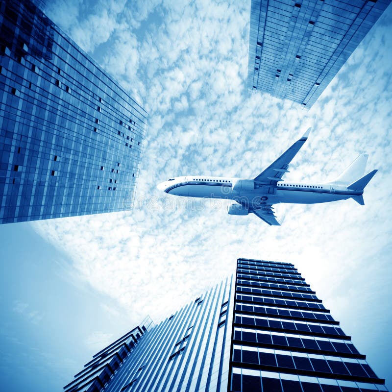Airplane over the city stock image. Image of tourism - 24695319