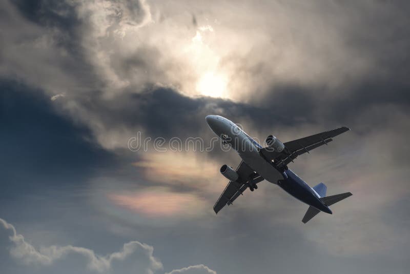 Airplane over the clouds stock photo. Image of airplane - 146913826